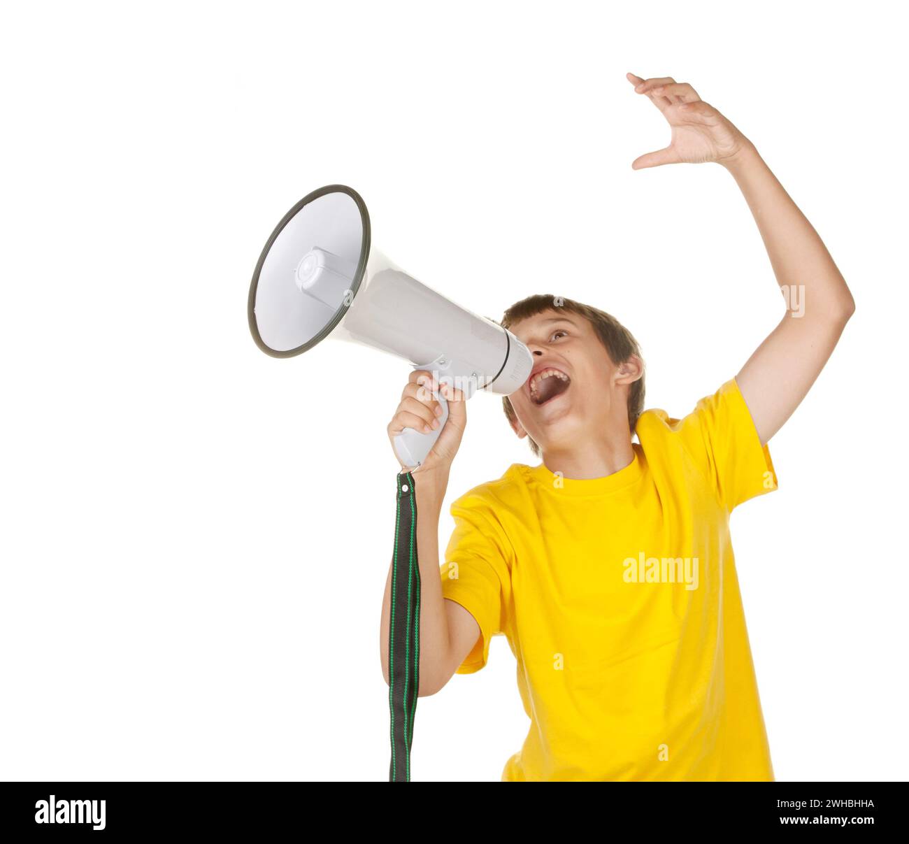 Boy yelling into a megaphone Stock Photo - Alamy