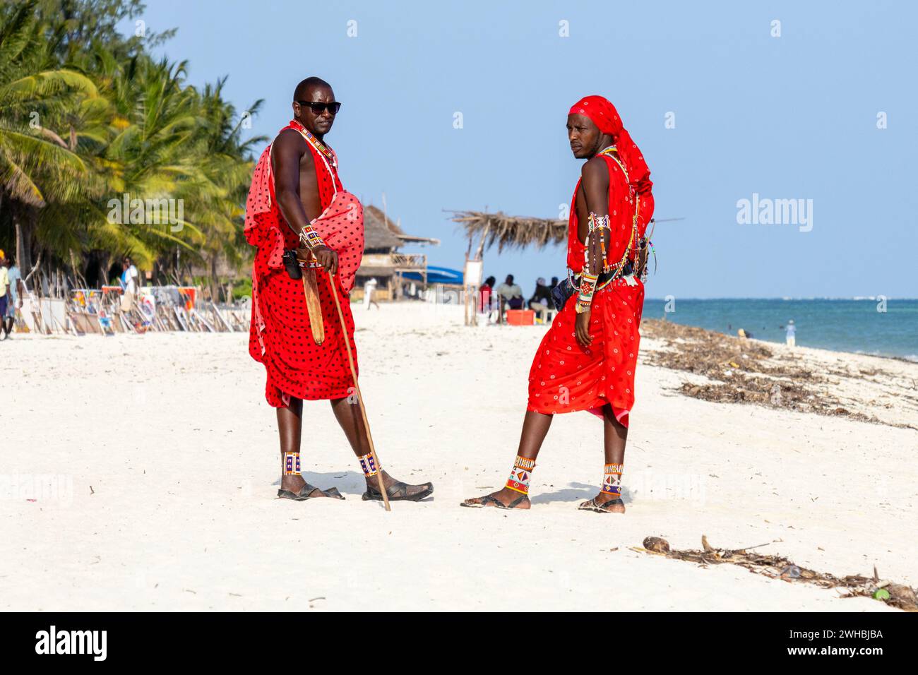Two beach guards dressed in traditional African Masai mara uniforms on ...