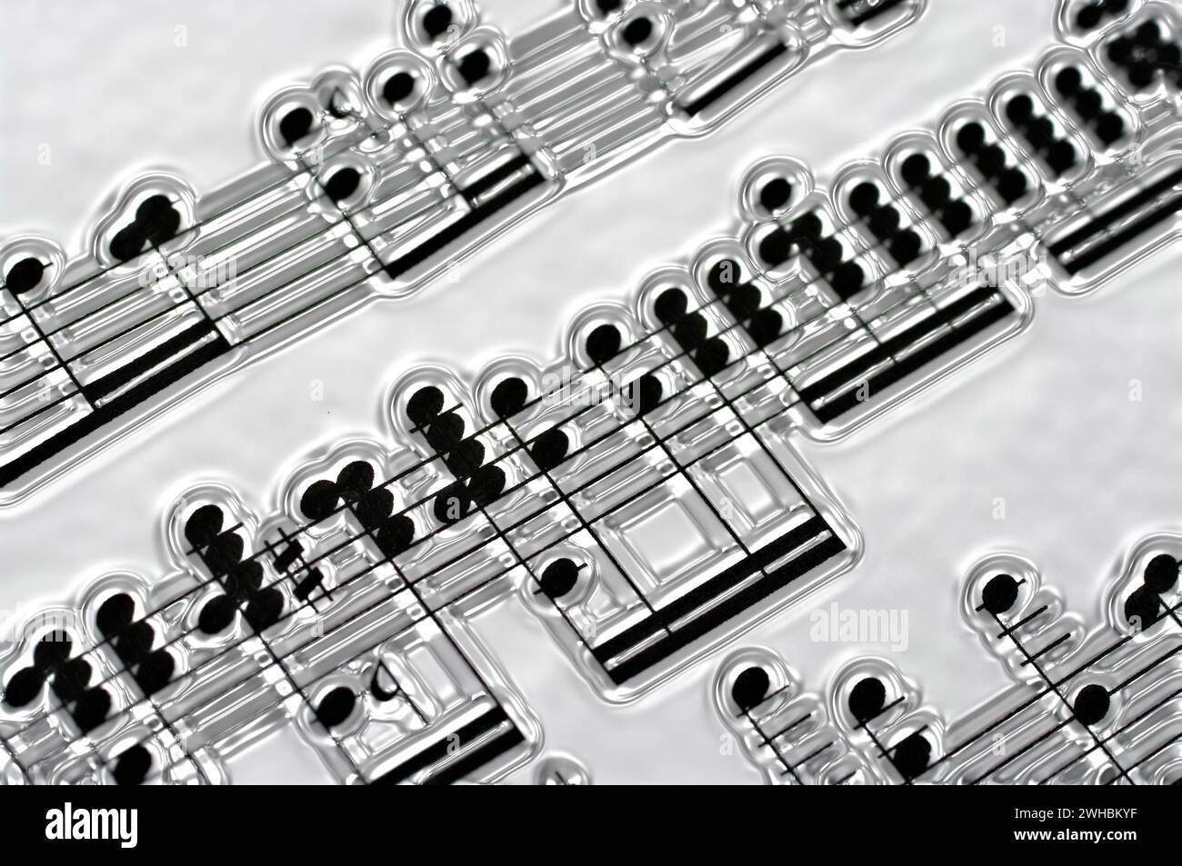 Music notes in silver Stock Photo - Alamy