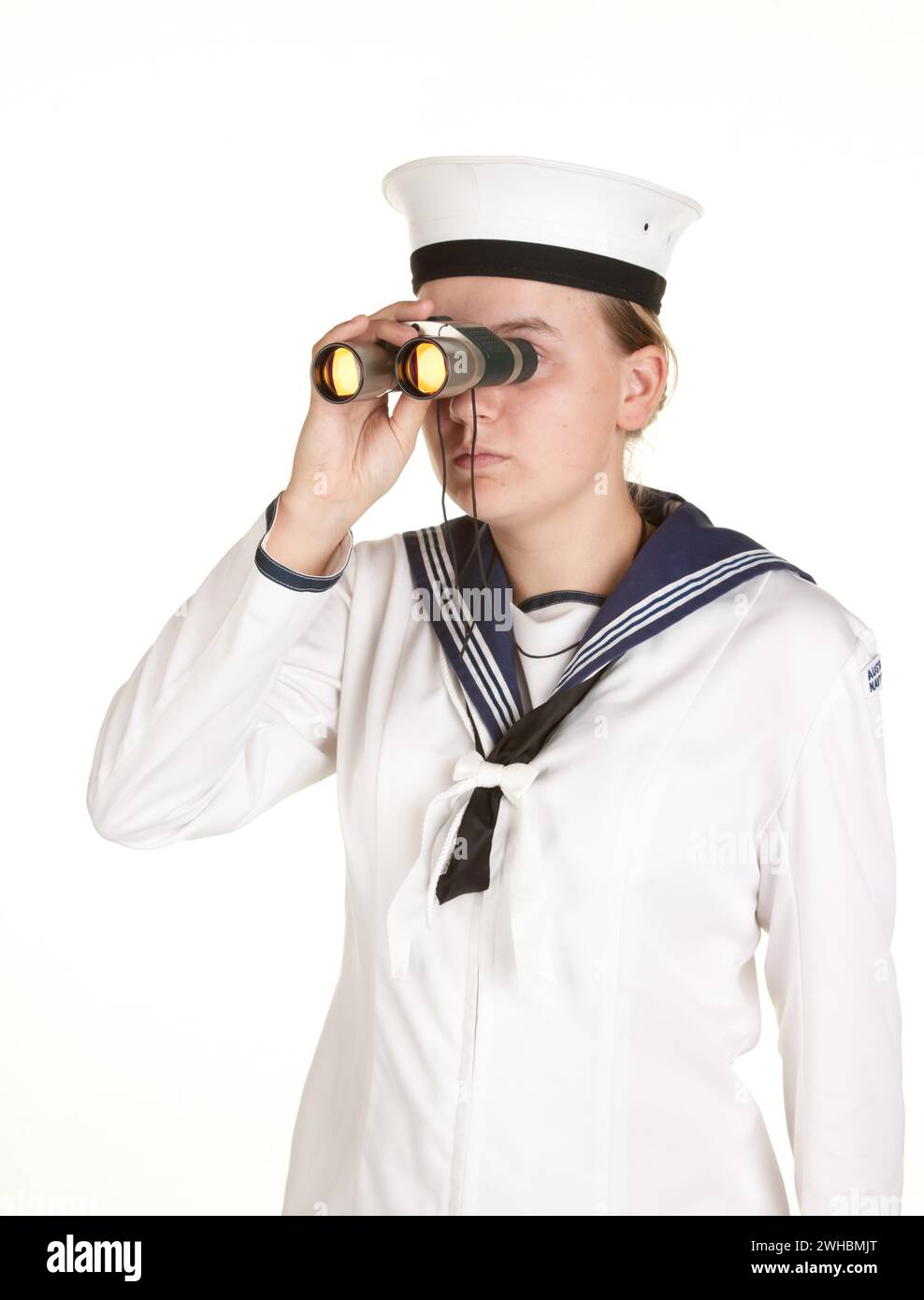 Young sailor with binoculars isolated white background Stock Photo - Alamy