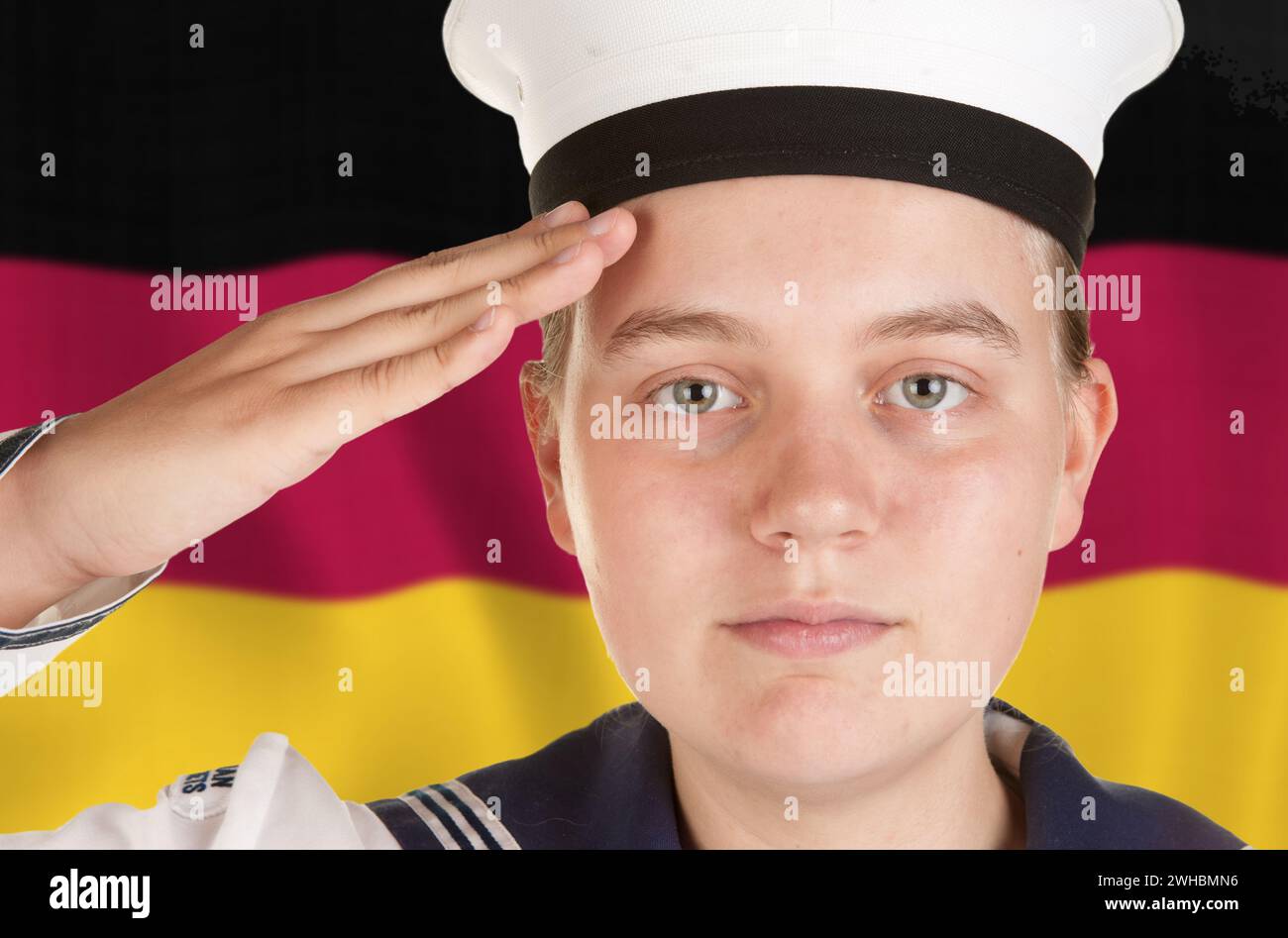 Young sailor saluting isolated white background Stock Photo - Alamy