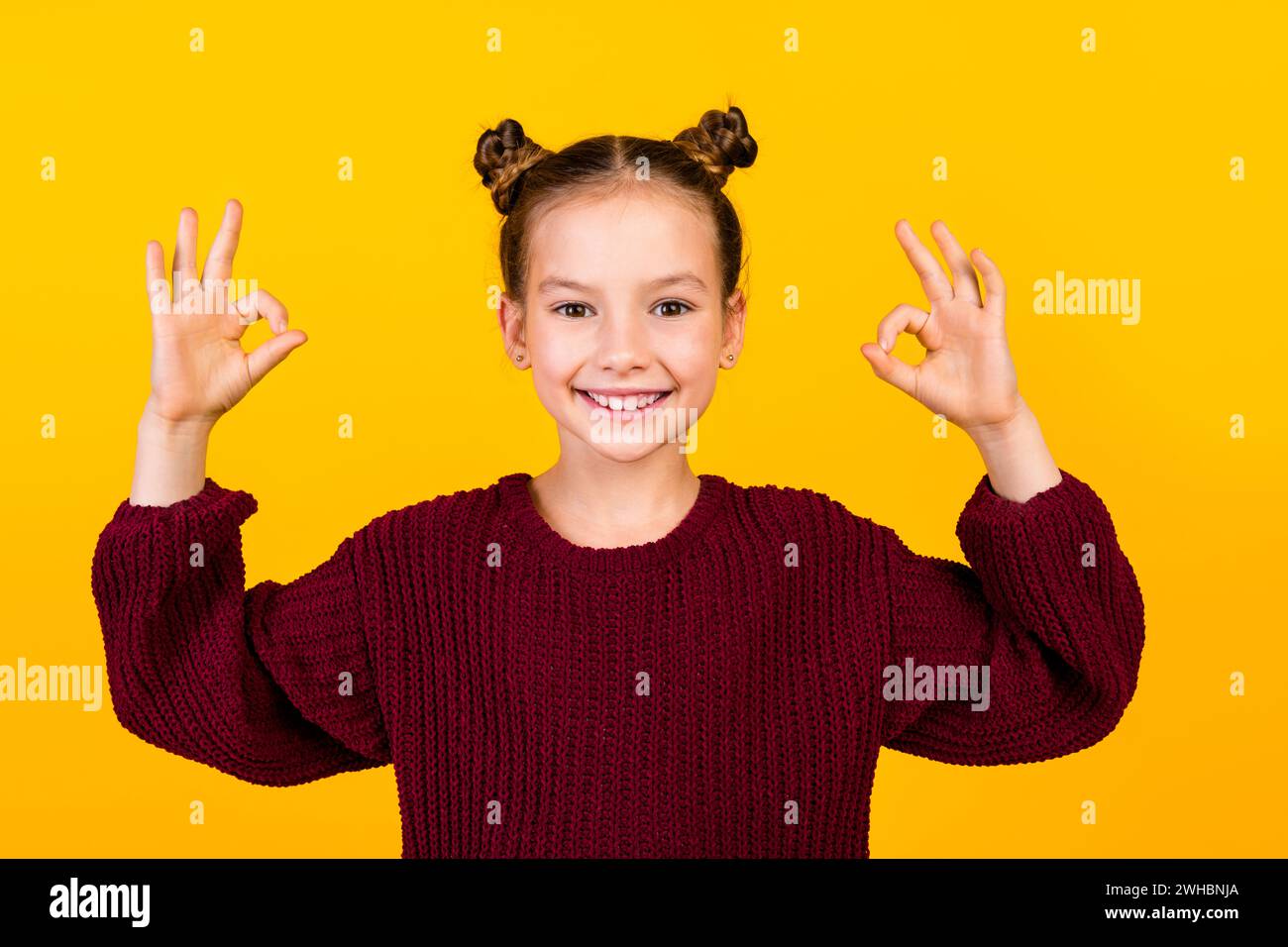 Photo of positive small schoolchild toothy smile show okey symbol ...