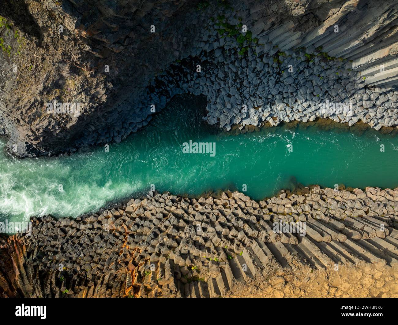 Majestic turquoise river running through unique white rock formations ...