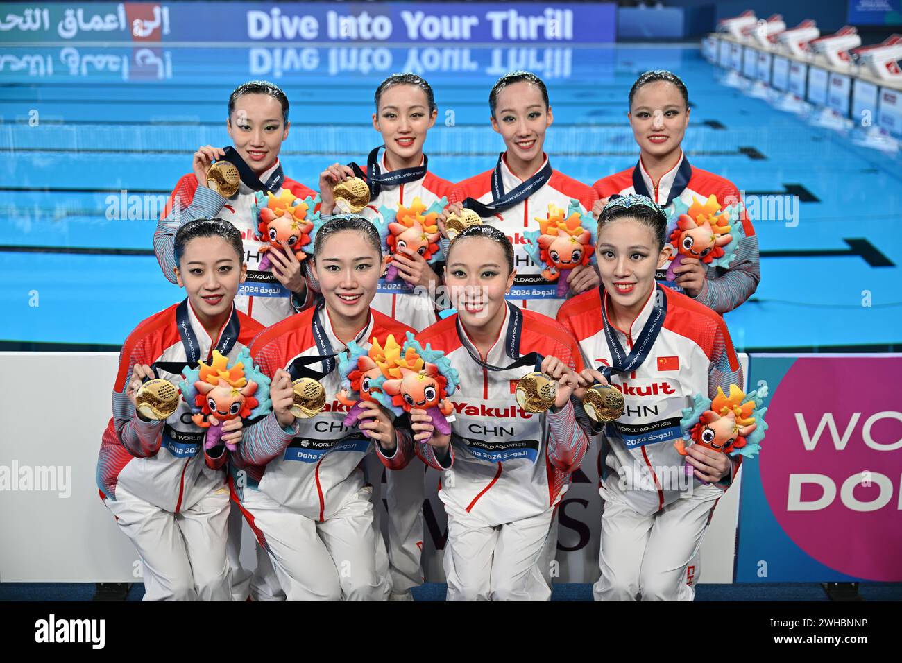 Doha, Qatar. 9th Feb, 2024. Team China pose after the awarding ceremony ...