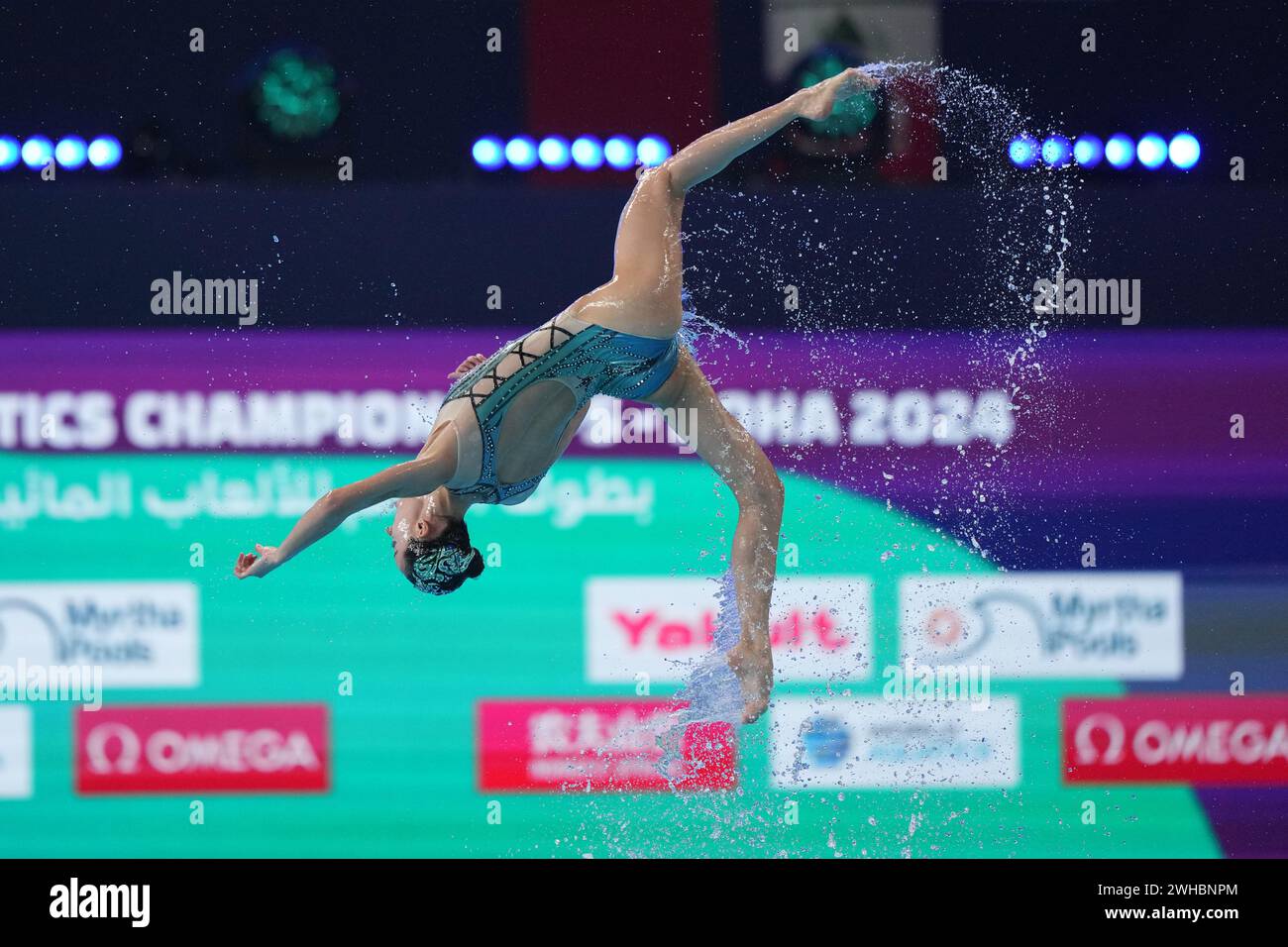 Doha, Qatar. 9th Feb, 2024. A swimmer of Team China performs during the ...