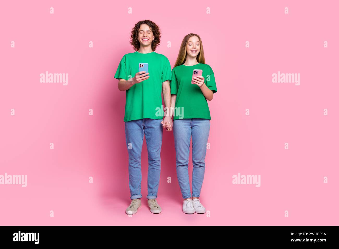 Full body photo of boyfriend and girlfriend texting telegram bot using ...