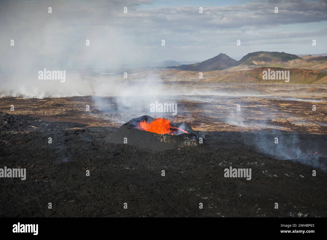 Stunning shot of dramatic moment of a volcano eruption, summit crater ...