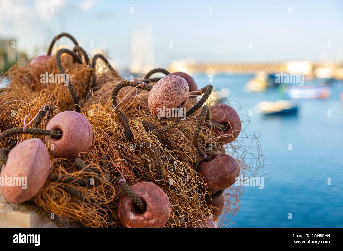 fishing nets with floats used to fish at sea Stock Photo - Alamy