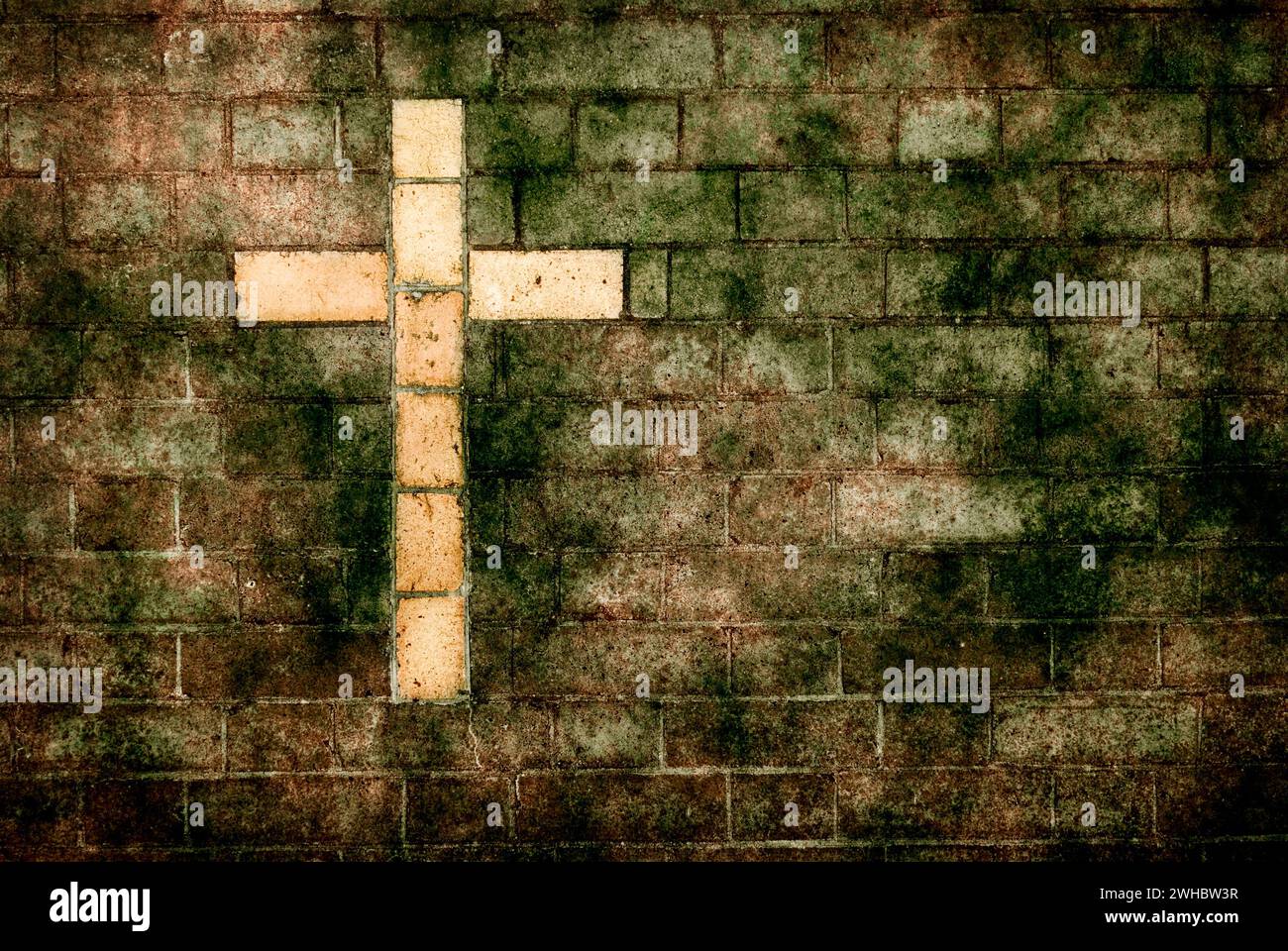 Cross of christ built into a brick wall Stock Photo - Alamy