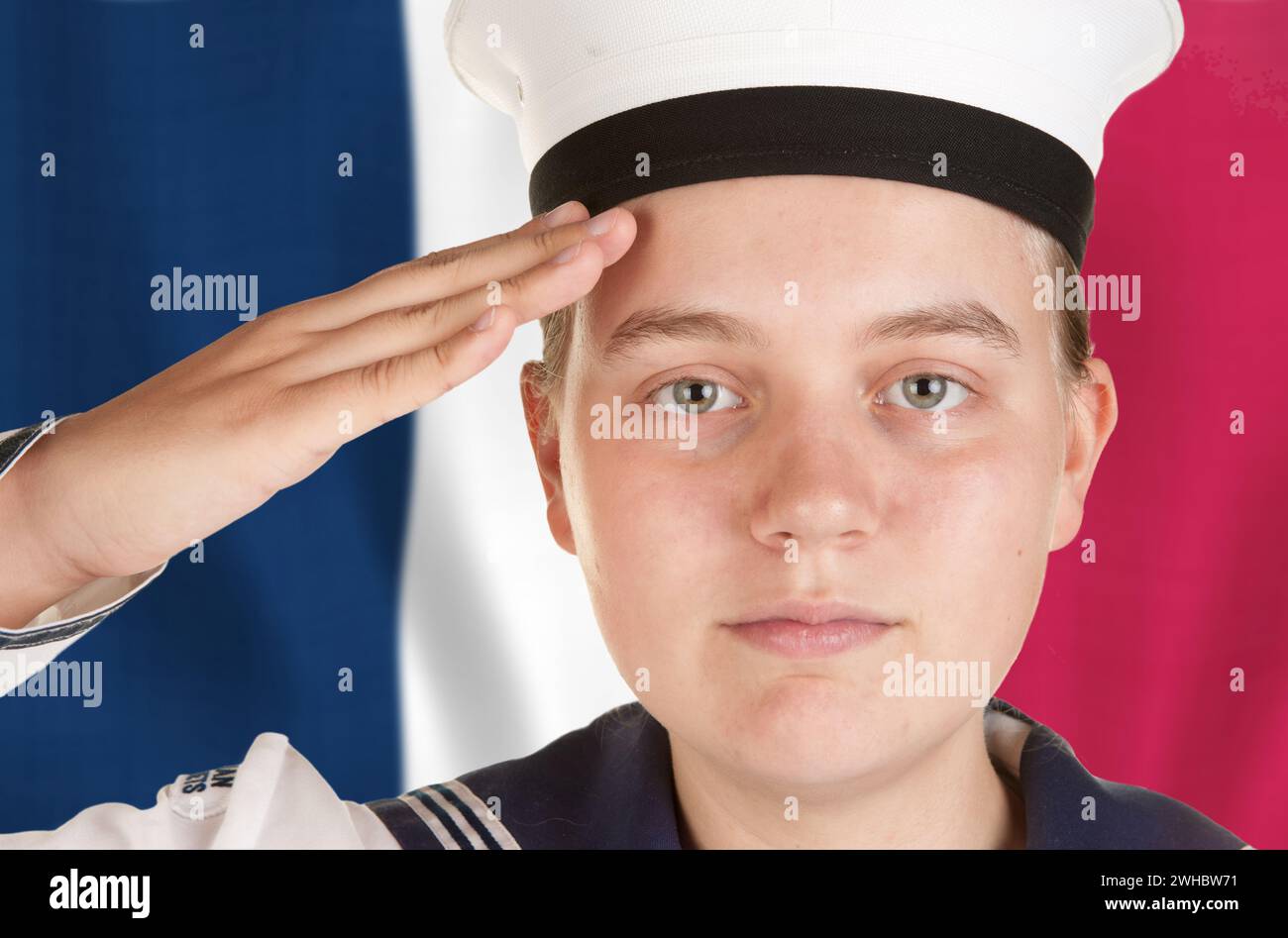 Young sailor saluting isolated white background Stock Photo - Alamy