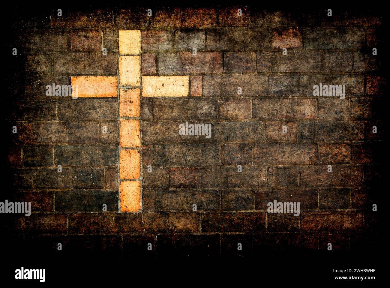 Cross of christ built into a brick wall Stock Photo - Alamy