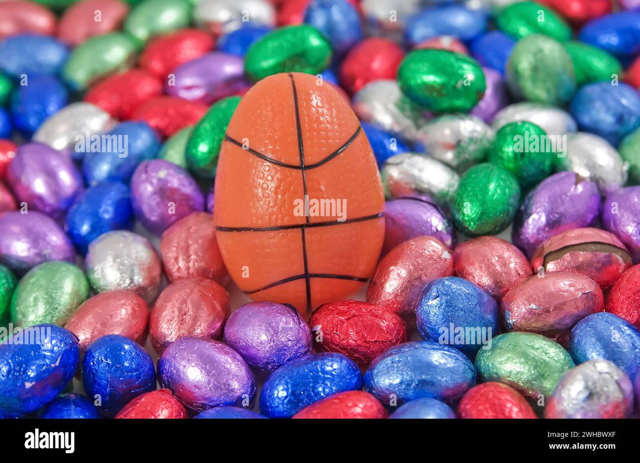 Basketball egg amongst other easter eggs Stock Photo - Alamy
