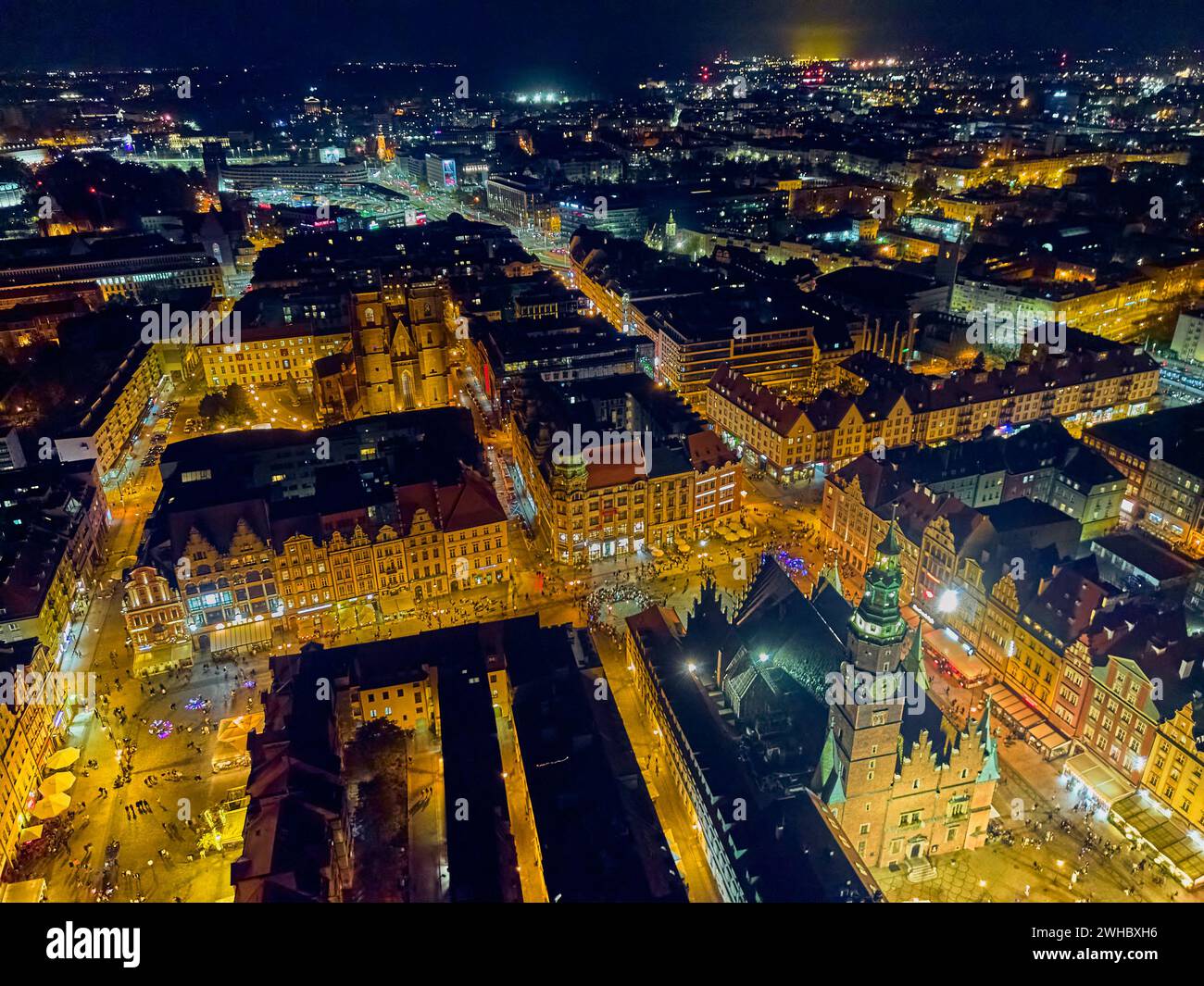 Aerial panoramic night view in the center of the old town, market ...