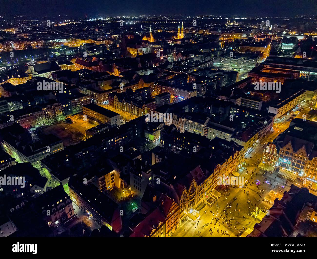 Aerial panoramic night view in the center of the old town, market ...
