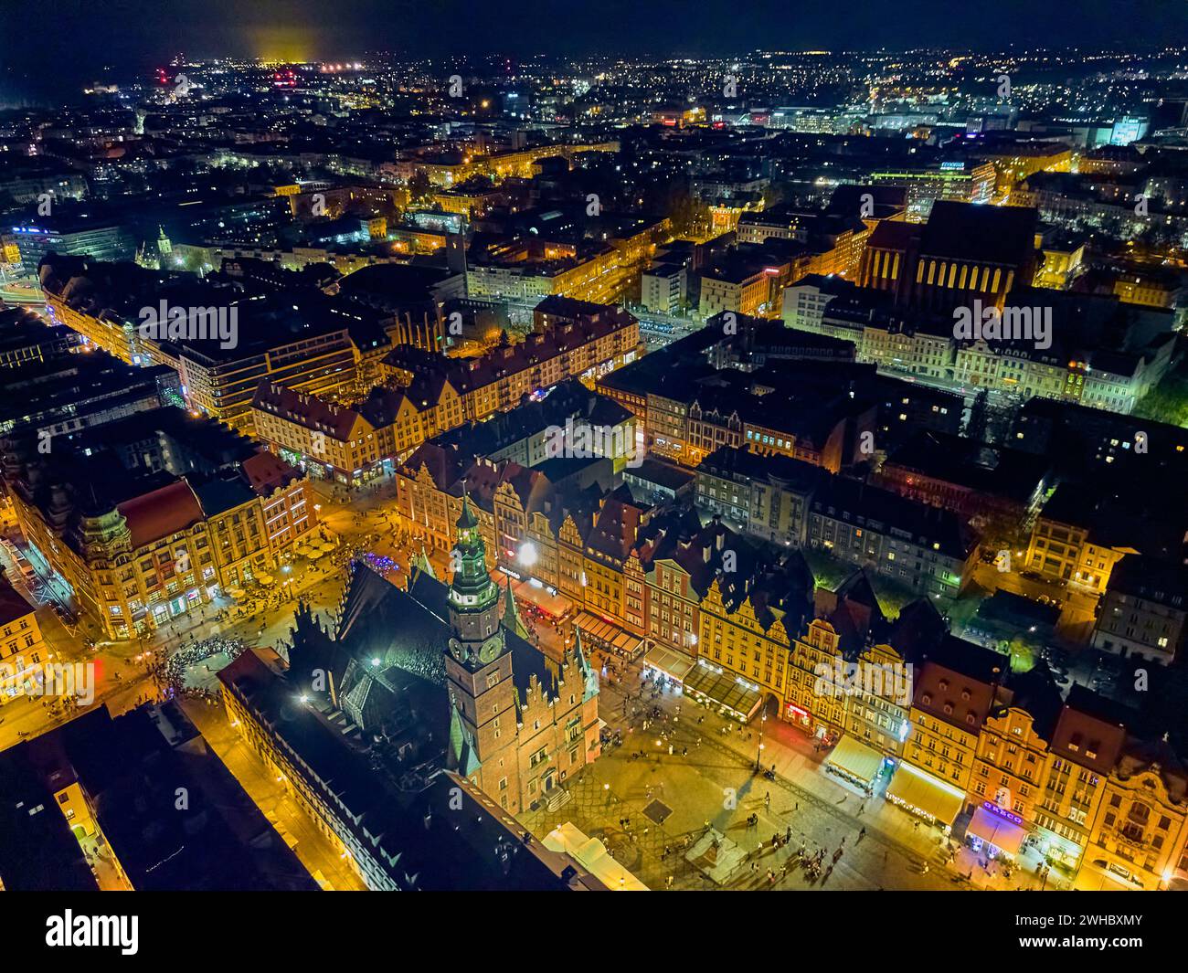 Aerial panoramic night view in the center of the old town, market ...