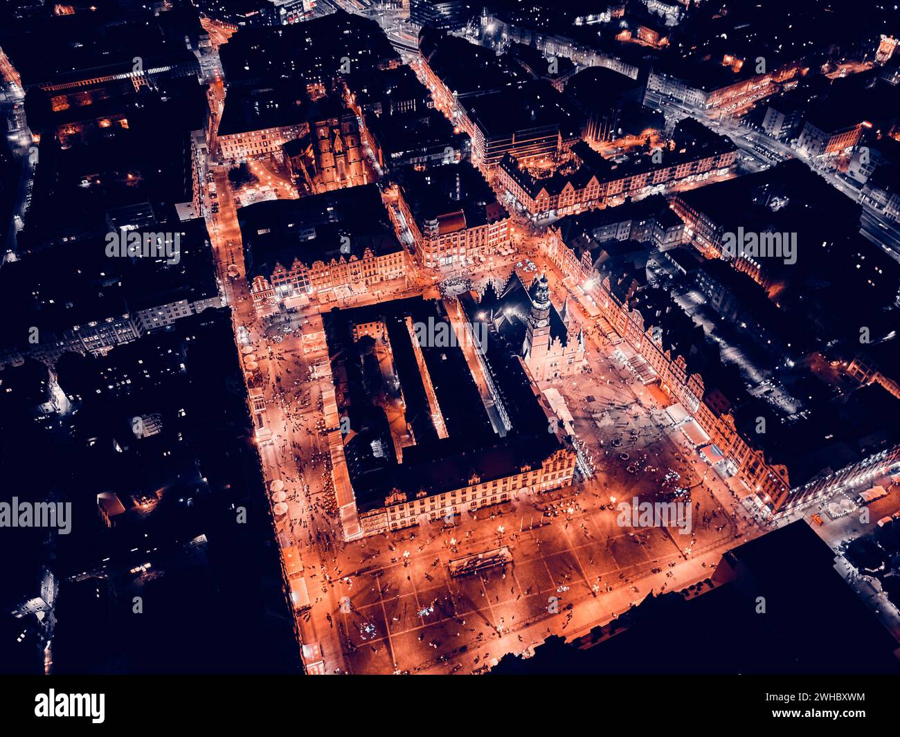 Aerial panoramic night view in the center of the old town, market ...