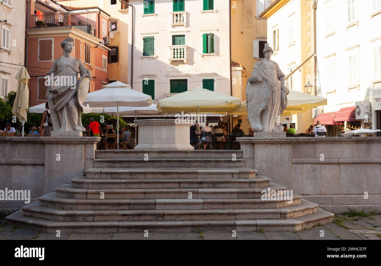 Piran, Slovenia - August 26, 2023: Old town Trg 1. maja square colorful ...