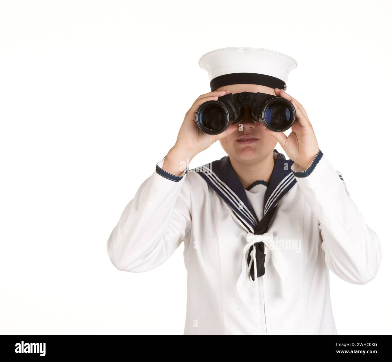 Young sailor with binoculars isolated white background Stock Photo - Alamy