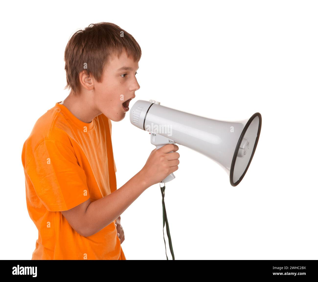 Boy yelling into a megaphone Stock Photo - Alamy