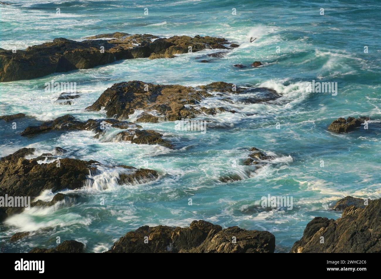 Rocks and waves Stock Photo - Alamy