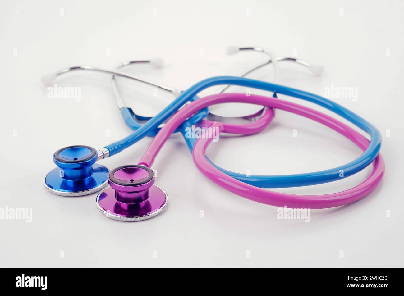 Pink and blue stethoscopes Stock Photo - Alamy