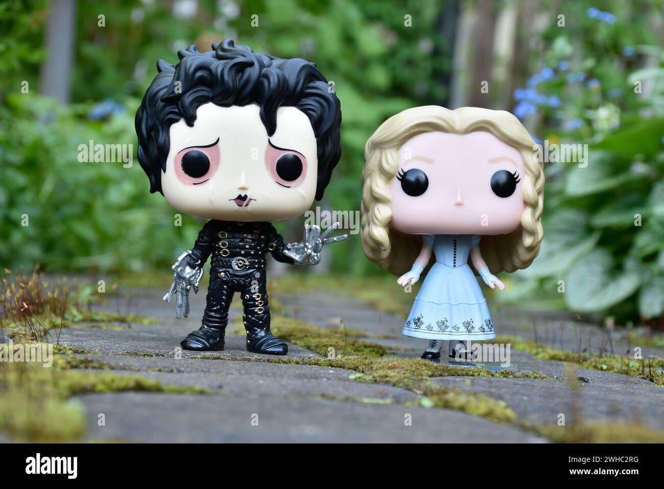 Funko Pop action figures of Edward Scissorhands and Alice in Wonderland ...