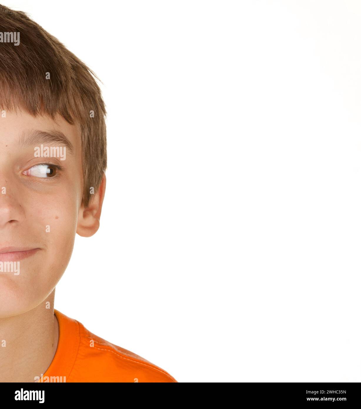 Boy looking at white copyspace Stock Photo - Alamy