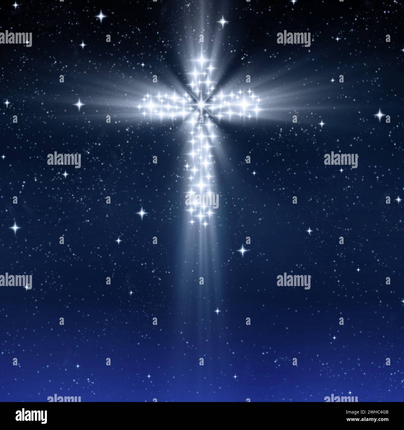 Glowing religious cross in stars Stock Photo - Alamy