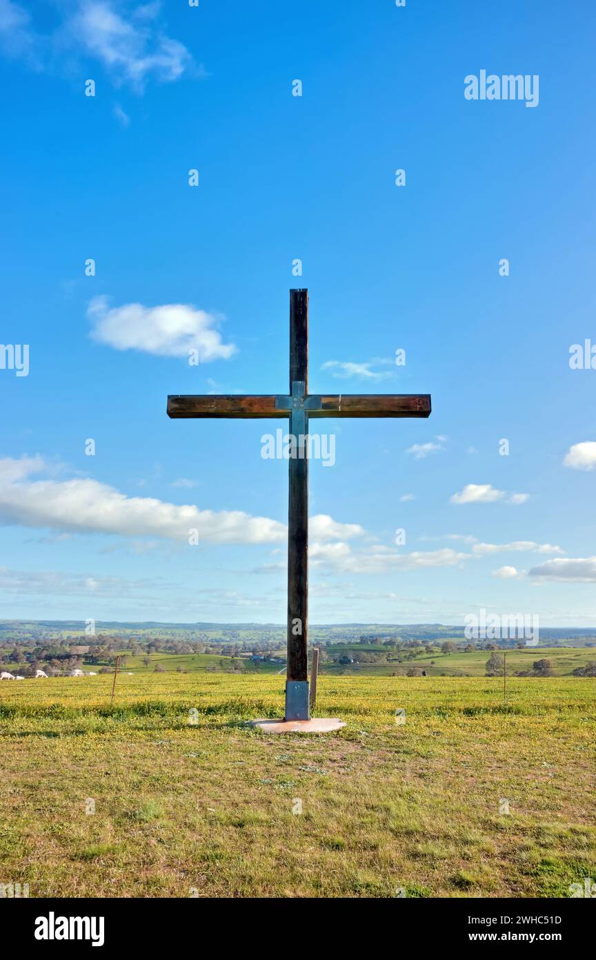 Christian cross of christ in field Stock Photo - Alamy