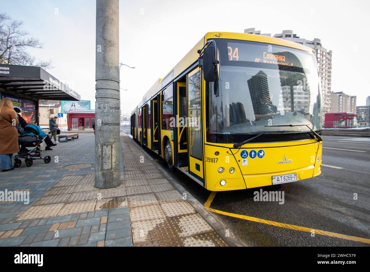Belarus, Minsk - 07 february, 2024: Bus at the bus stop close up Stock ...