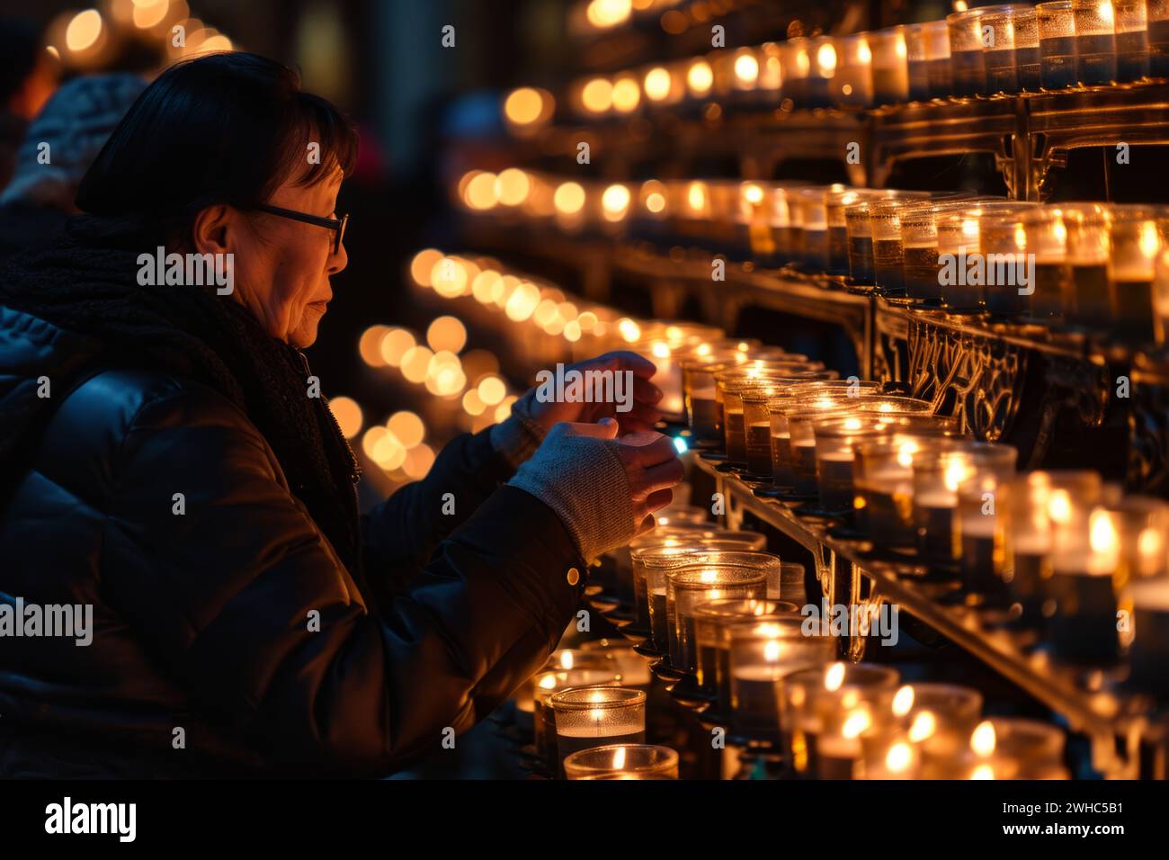 Japanese people praying lighting hi-res stock photography and images ...