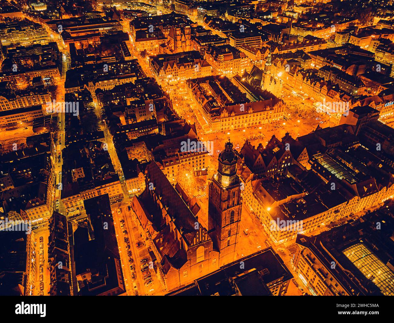 Aerial panoramic night view in the center of the old town, market ...