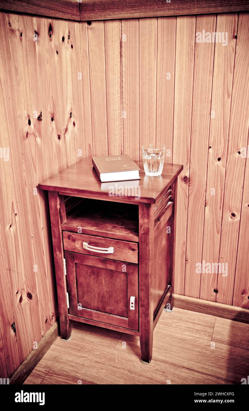 Bible on bed side table Stock Photo - Alamy