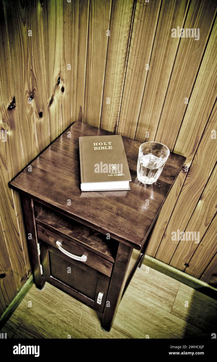 Bible on bed side table Stock Photo - Alamy