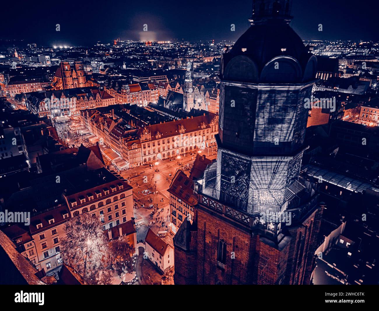 Aerial panoramic night view in the center of the old town, market ...