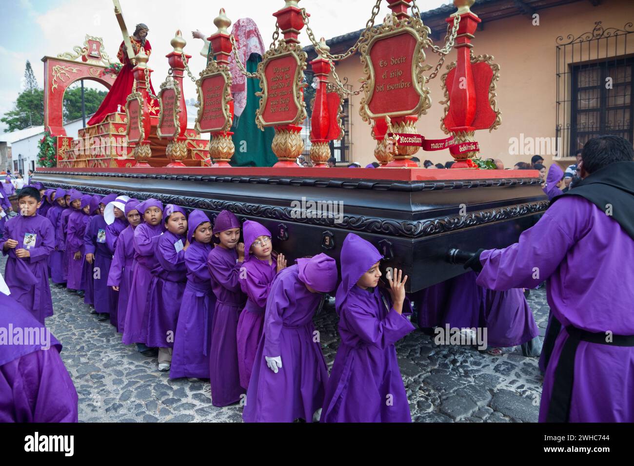 Antigua, Guatemala. Adolescent Boys Carrying a Float (Anda) in a ...