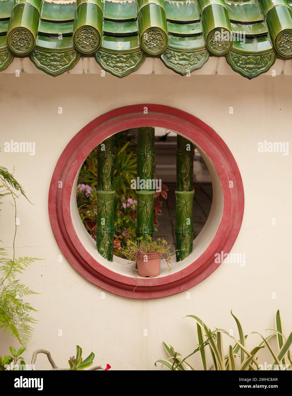 Round window in wall Stock Photo - Alamy