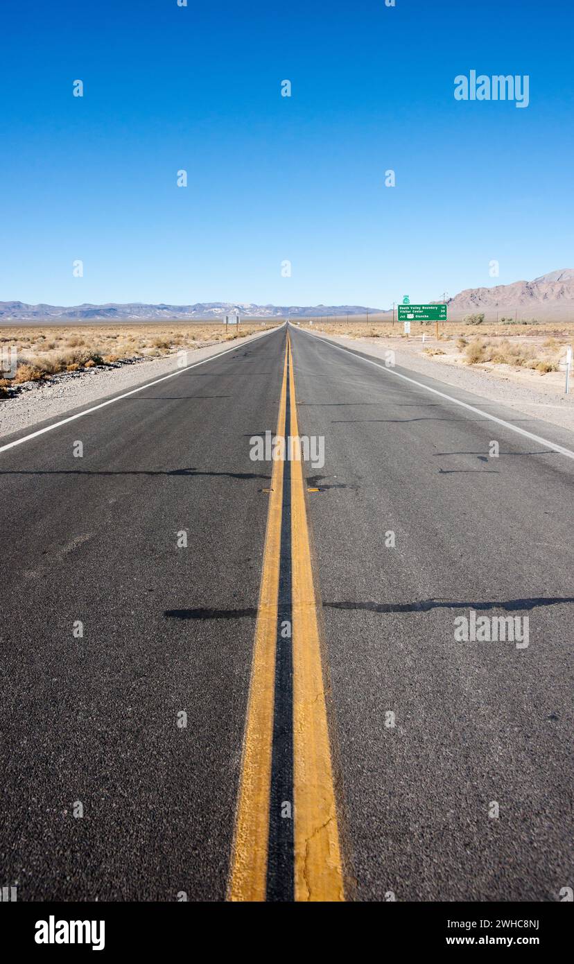 Long highway through desert Stock Photo - Alamy
