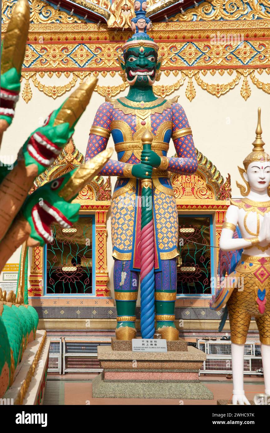 Statues outside temple Stock Photo - Alamy