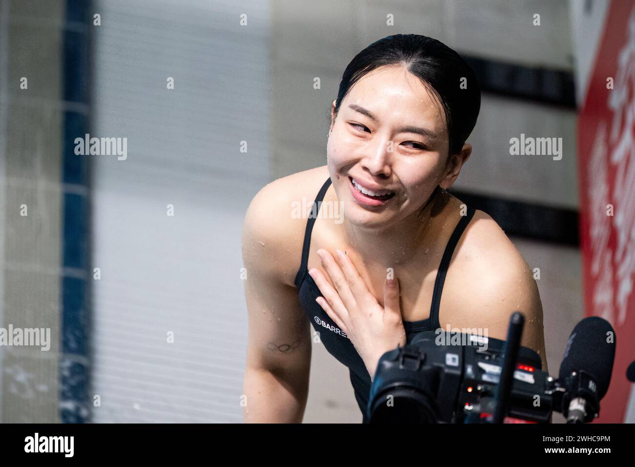 Doha, Qatar. 09th Feb, 2024. Suji Kim of Korea reacts after winning the bronze medal in the ...