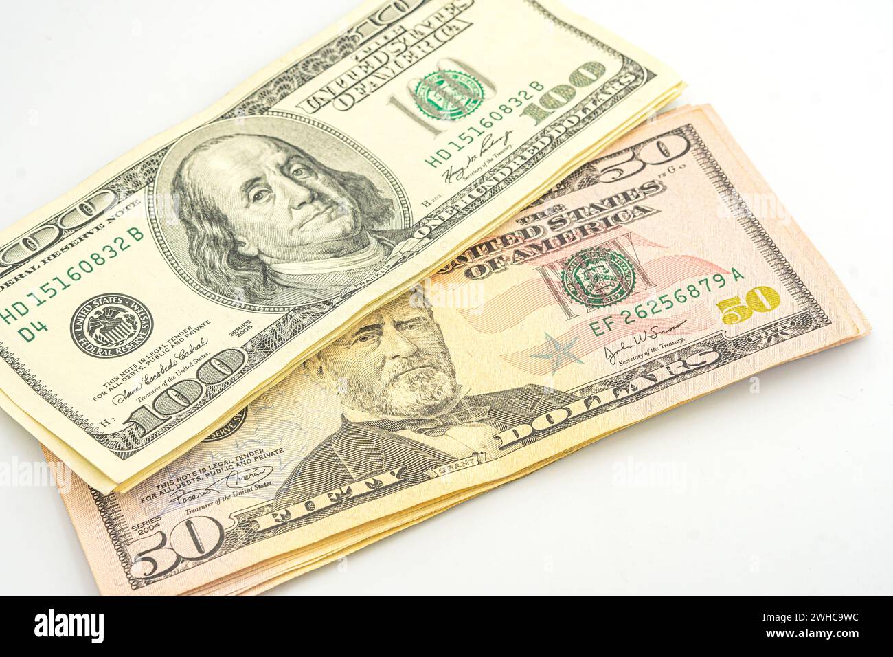 Bundles of hundred dollar bills hi-res stock photography and images - Alamy