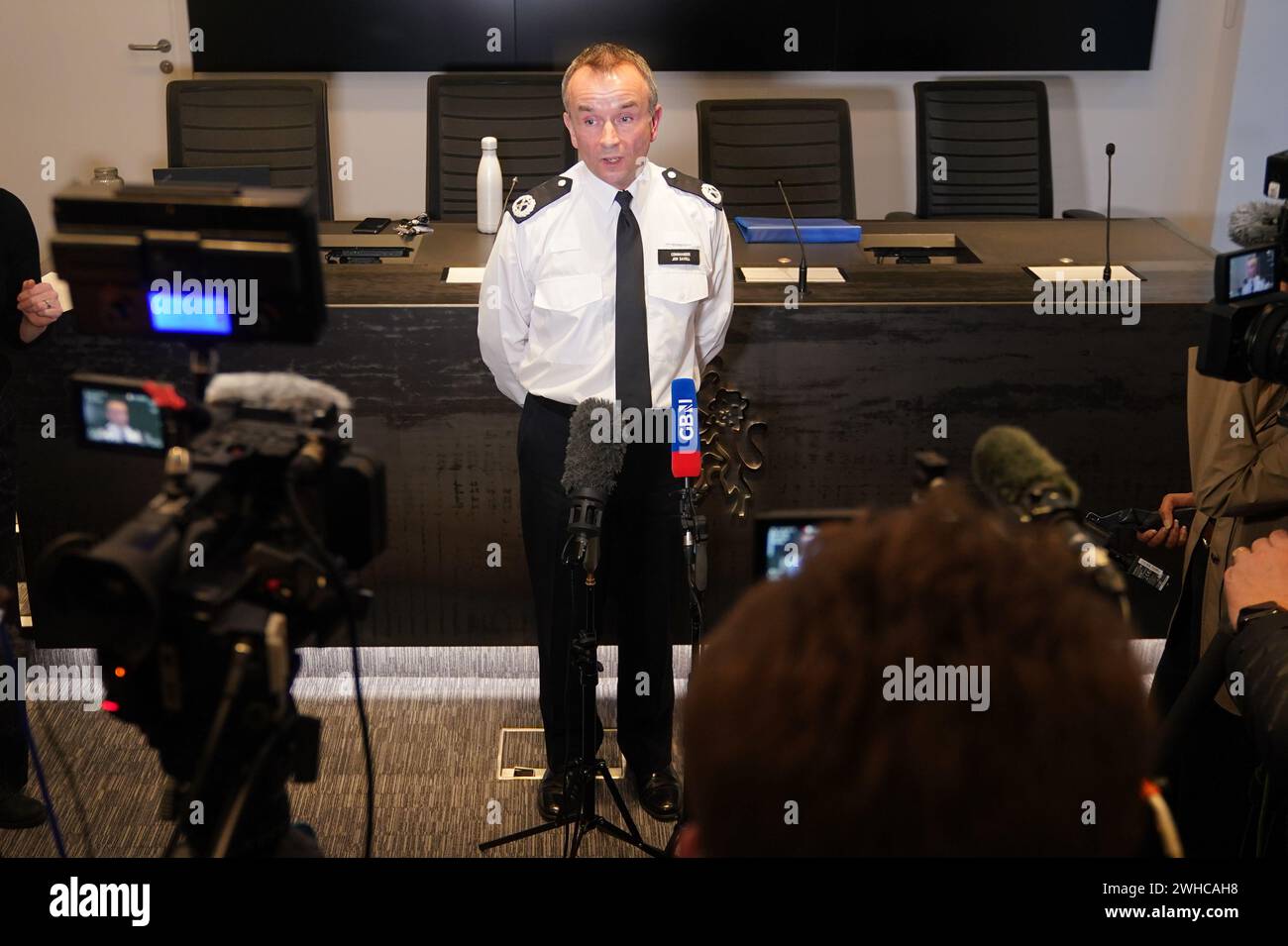 Commander Jon Savell speaking to the media at Scotland Yard in London ...