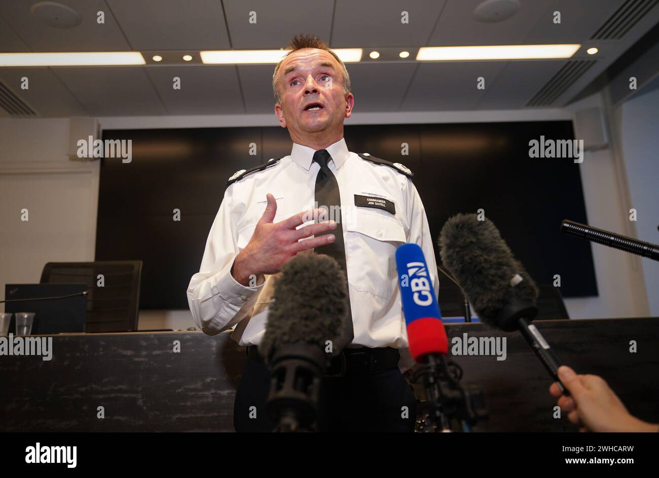 Commander Jon Savell speaking to the media at Scotland Yard in London ...