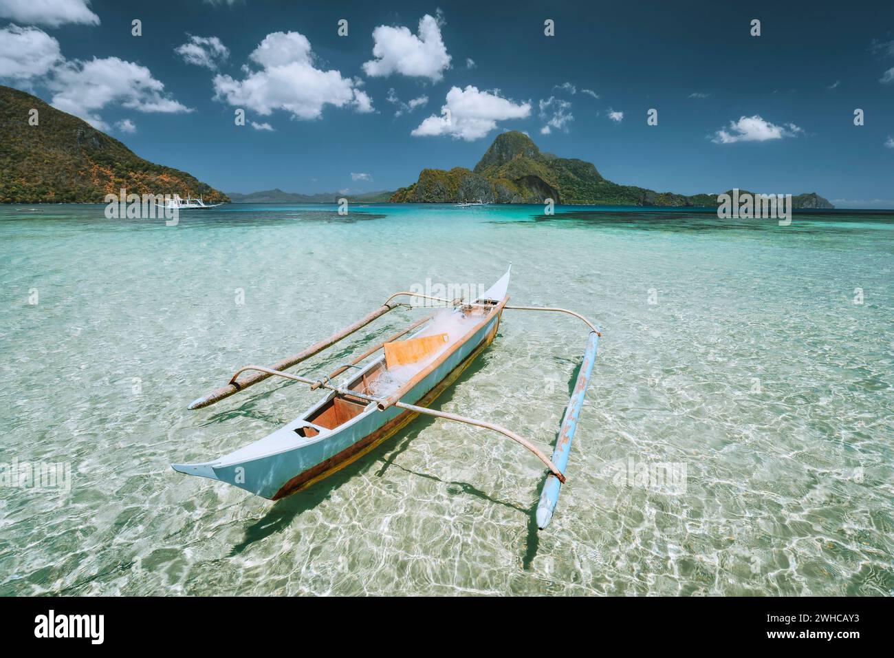 Palawan, Philippines. Traditional small fishing banca boat in front of ...