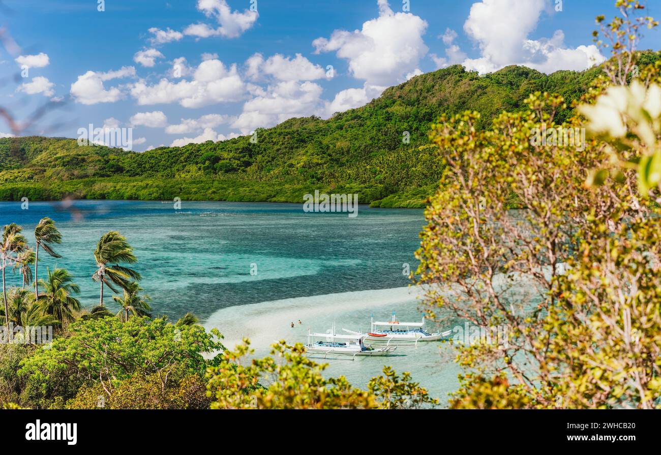El Nido, Palawan, Philippines. Snake island blue bay with traditional ...