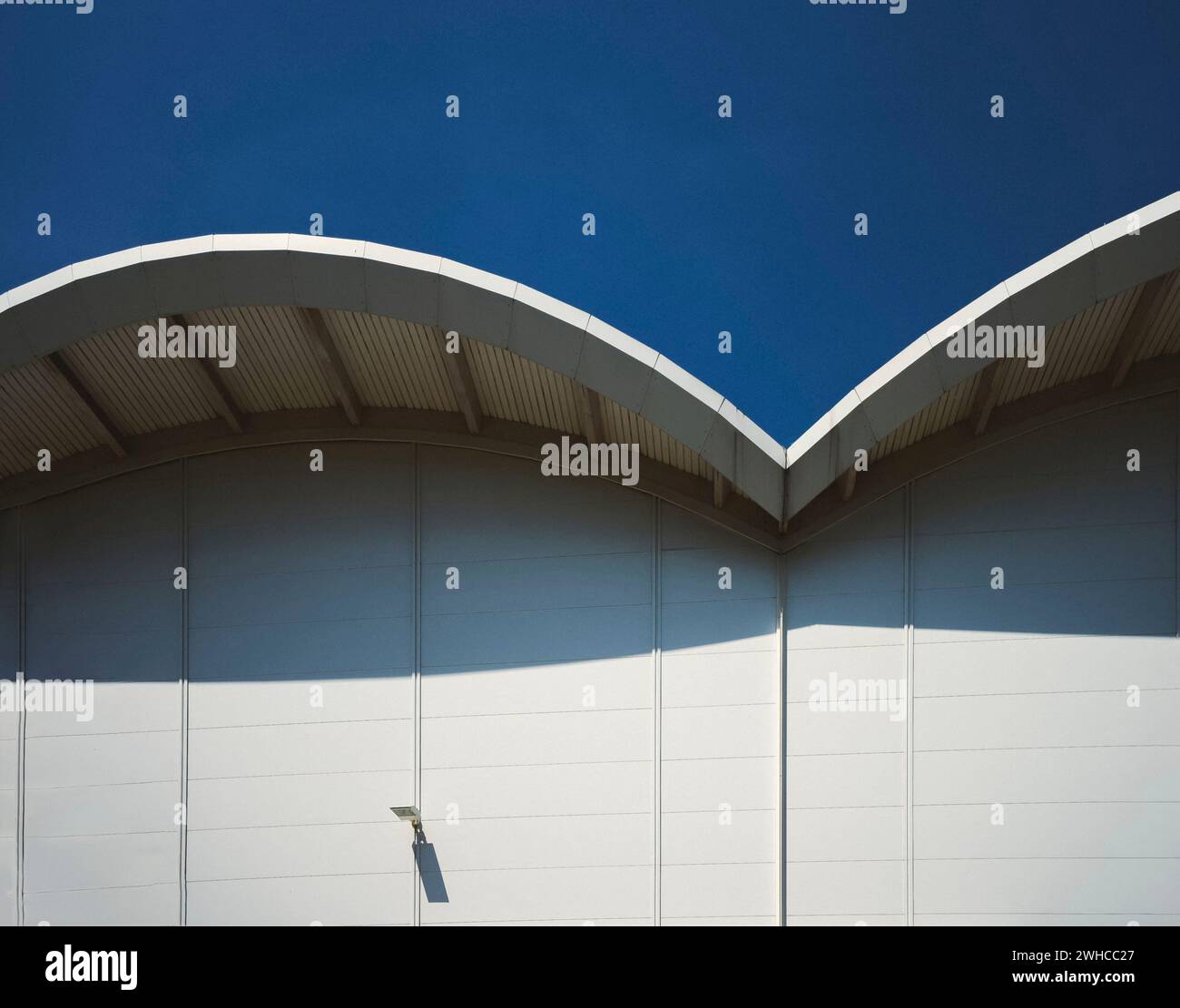Arch formed roof of modern building used for aircraft exhibitions hi ...