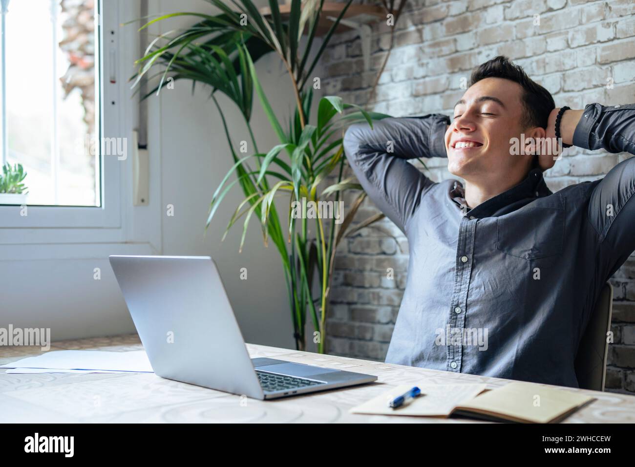 Boy sit in chair hi-res stock photography and images - Alamy