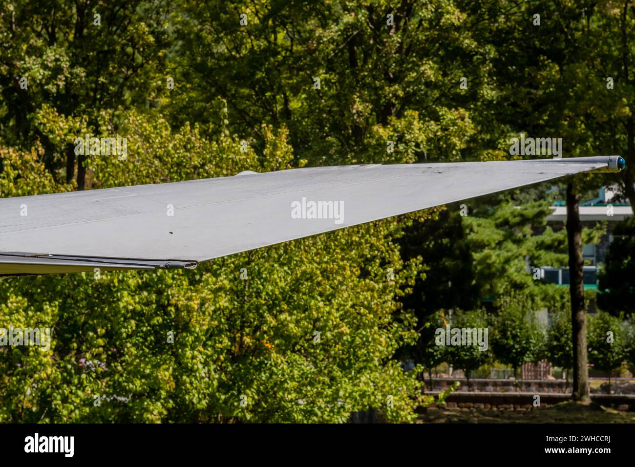 Starboard wingtip of jet fighter on display in public park Stock Photo ...