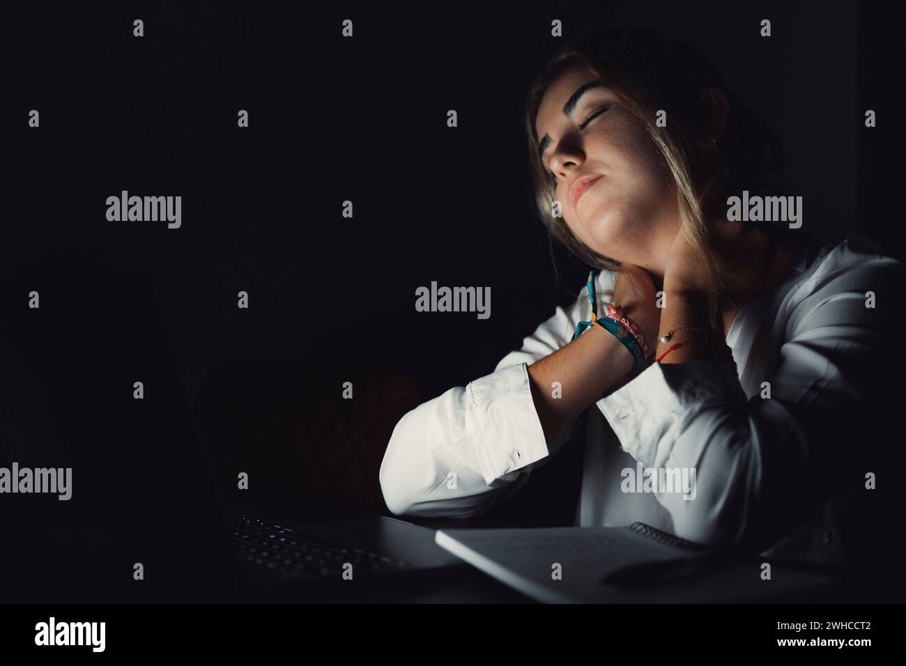 Overwhelmed young caucasian student touching neck, suffering from bad ...