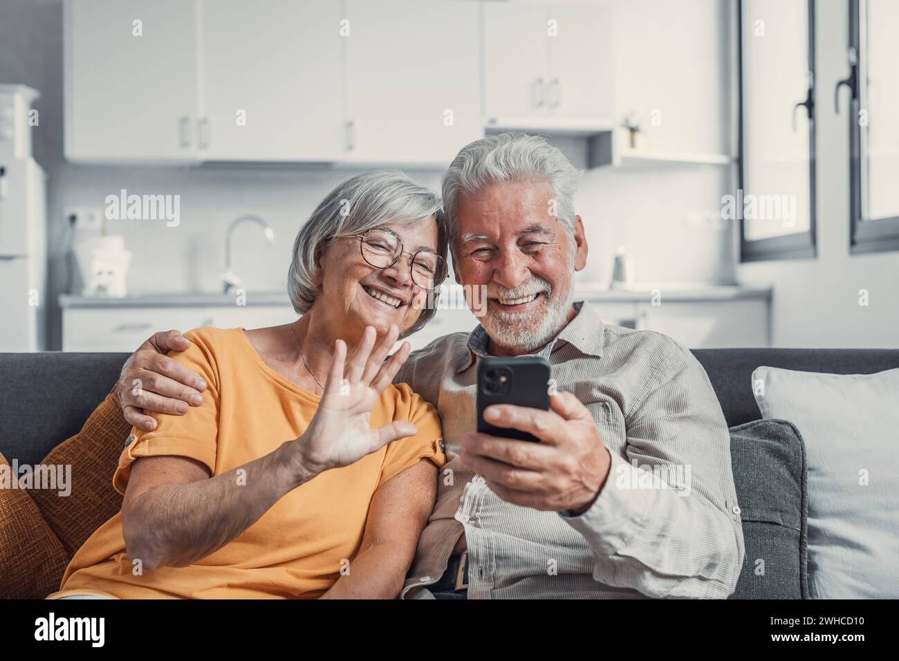 Smiling woman having online video hi-res stock photography and images ...